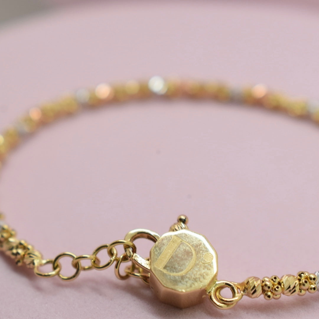 *LIMITED* 18K Gold - Dorica Single Line Tri Color Bangle – Sana Jewellers